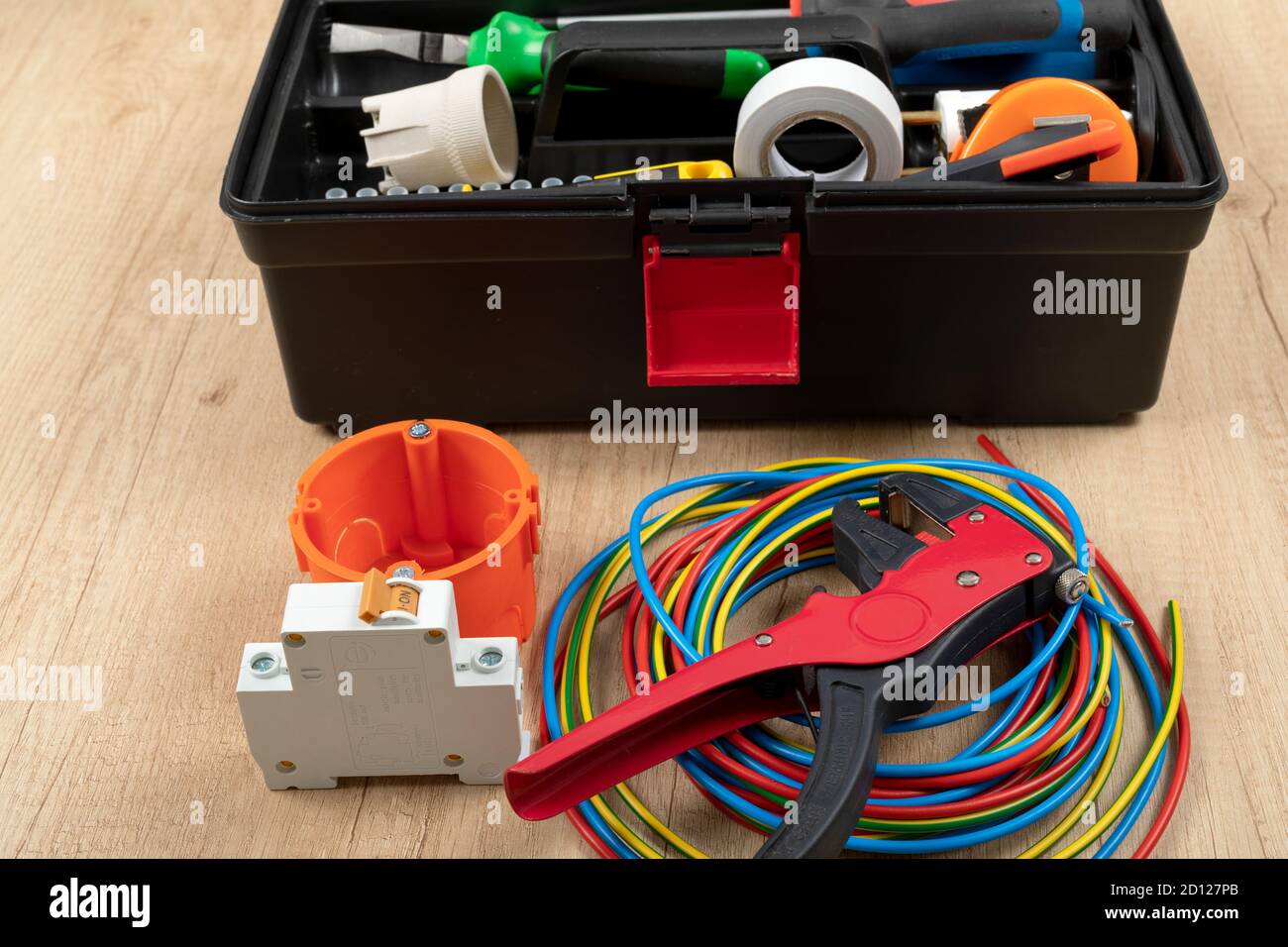 Tools for electrician needs: voltage testers, wire strippers, pliers ...