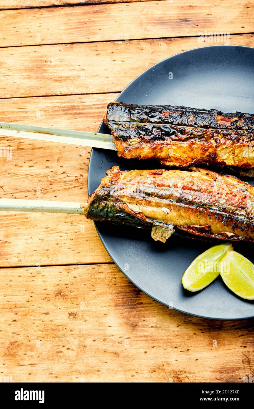 Fish kebab from mackerel. Mackerel on skewers. Grilled fish Stock Photo ...