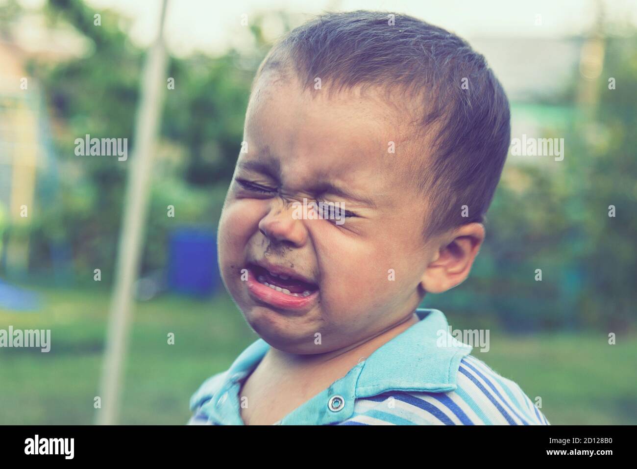 Portrait of a crying baby boy. Crying baby boy. Outdoor Stock Photo - Alamy