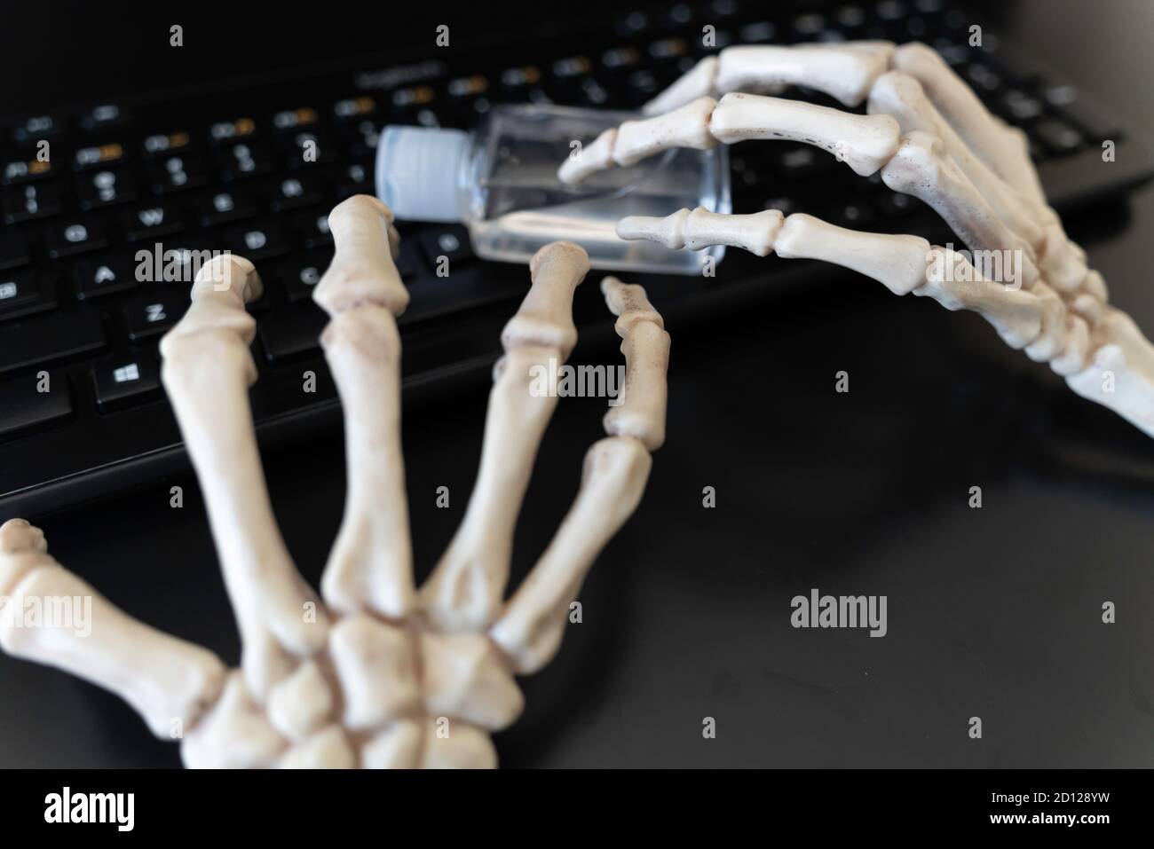 Skeleton Claw hands working on keyboard during Halloween Stock Photo ...