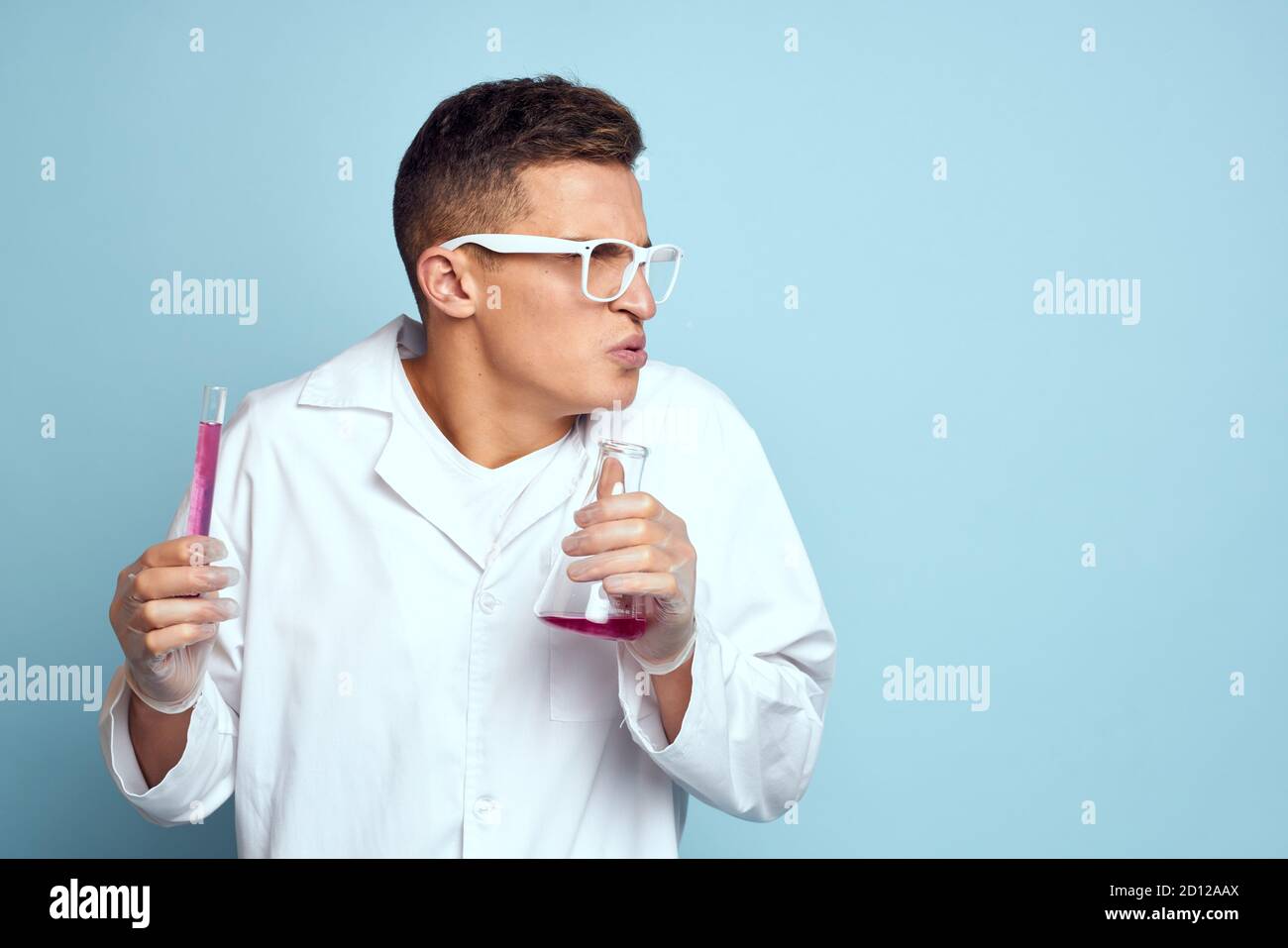 man holding flasks colorful liquid chemical laboratory model wearing ...