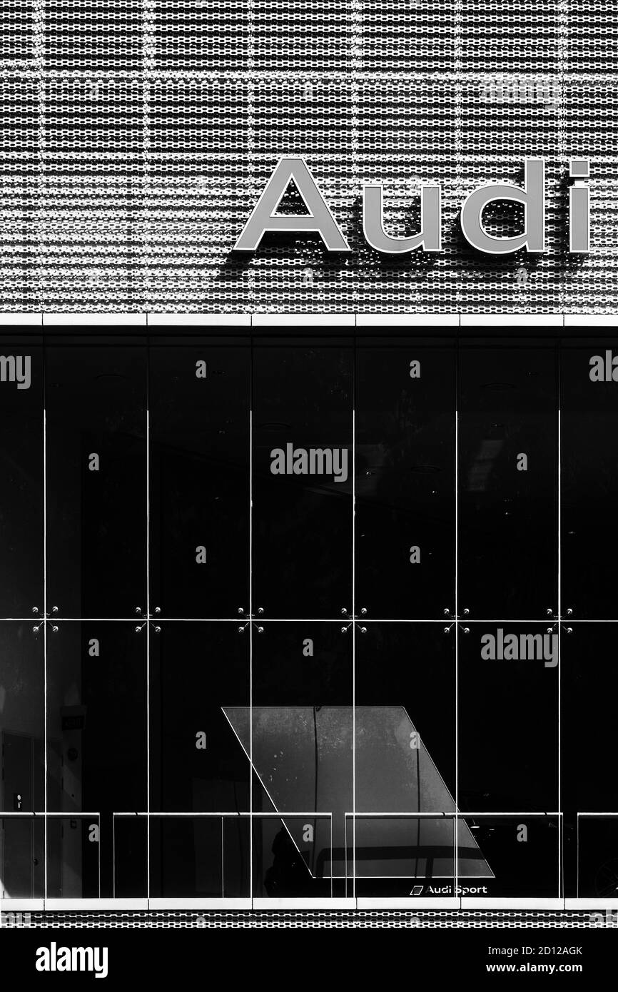 Black and white close up view of Audi showroom, brand logo and building ...