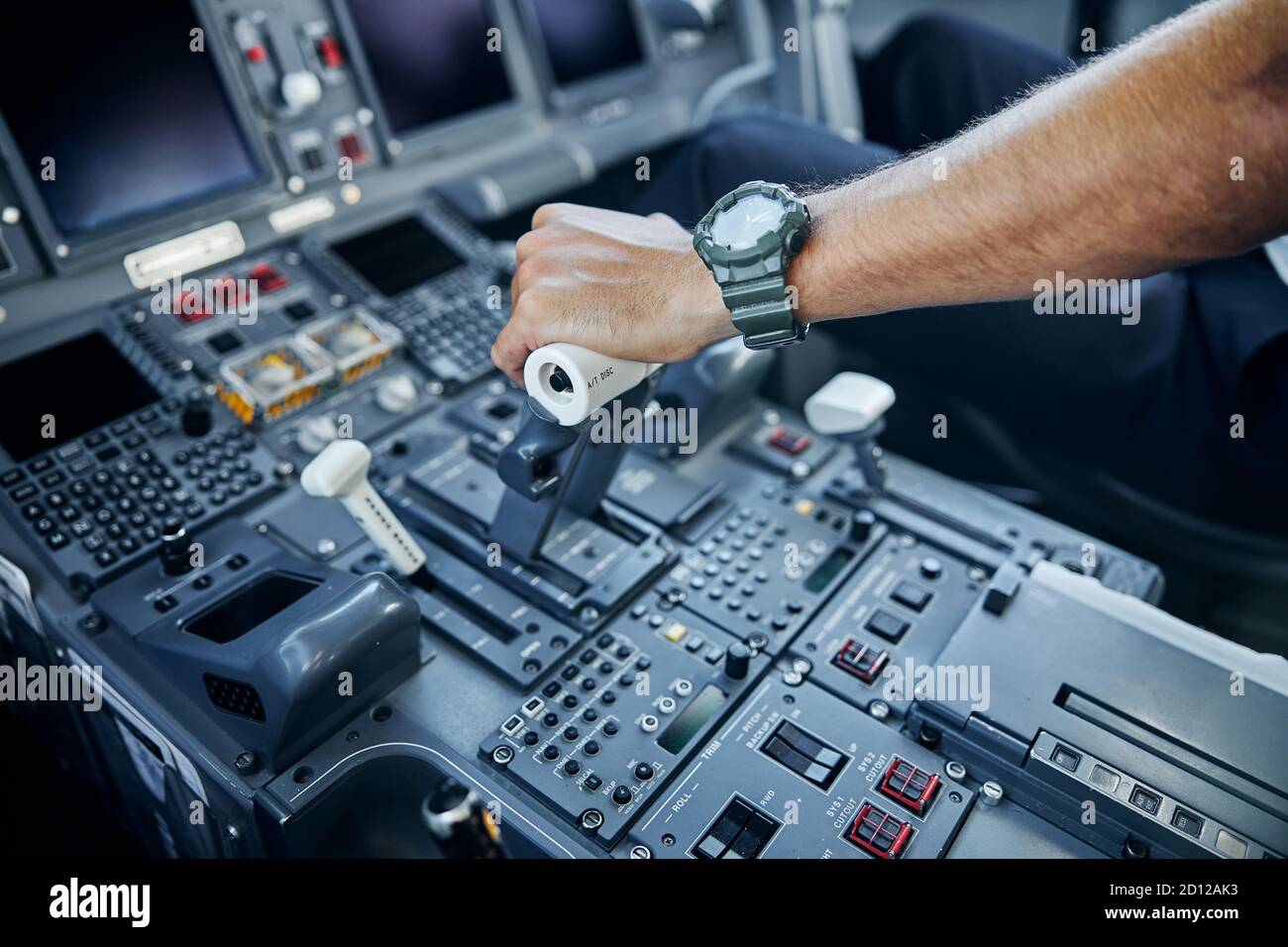 Male professional pilot taking off passenger plane Stock Photo - Alamy