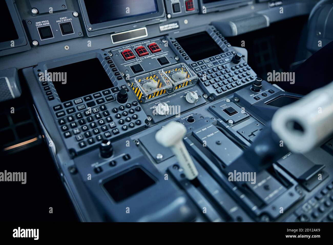 Digital panel with levers for flying passenger plane Stock Photo - Alamy