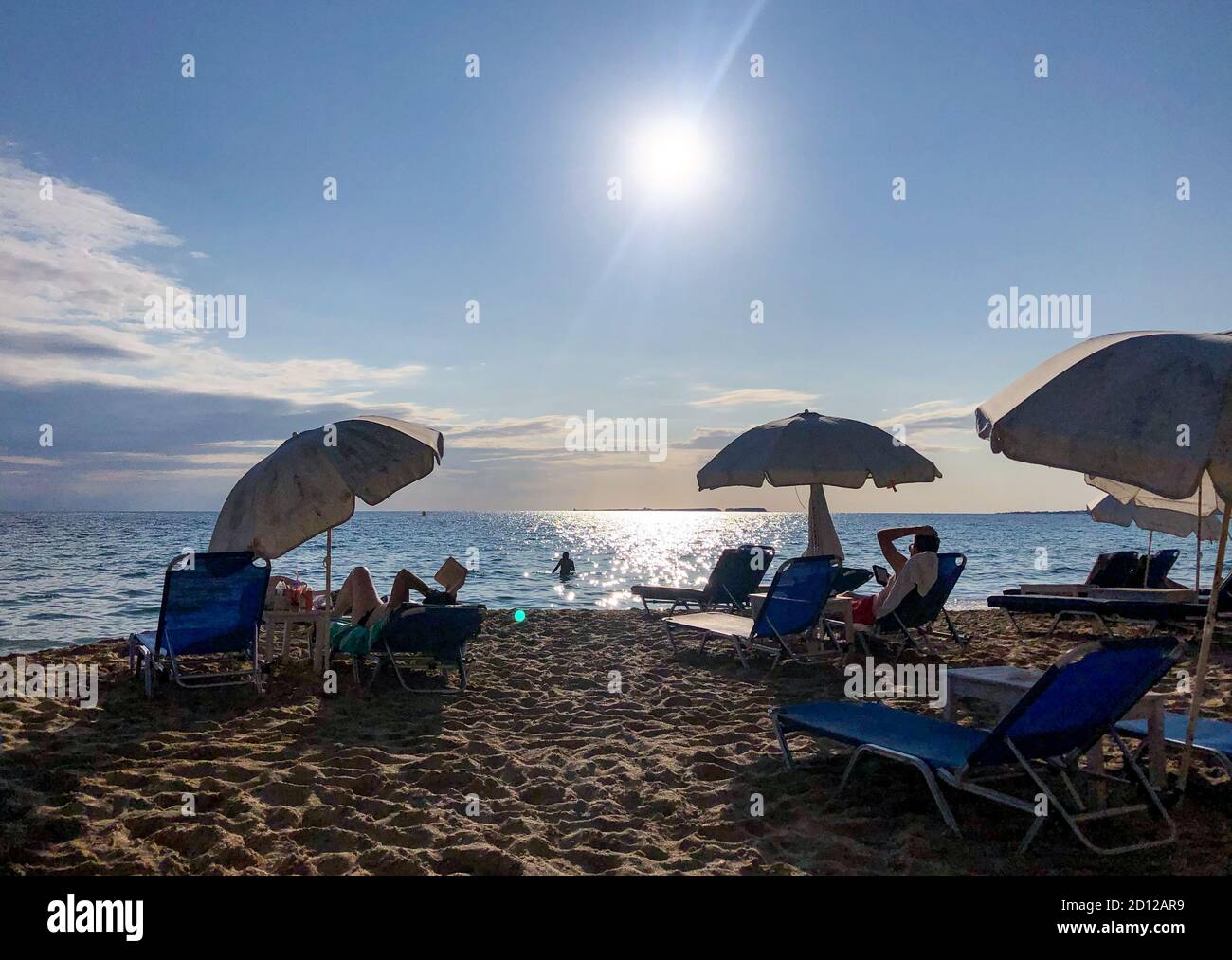 01 October 2020, Greece, Makris Gialos: Holidaymakers at the beach of ...