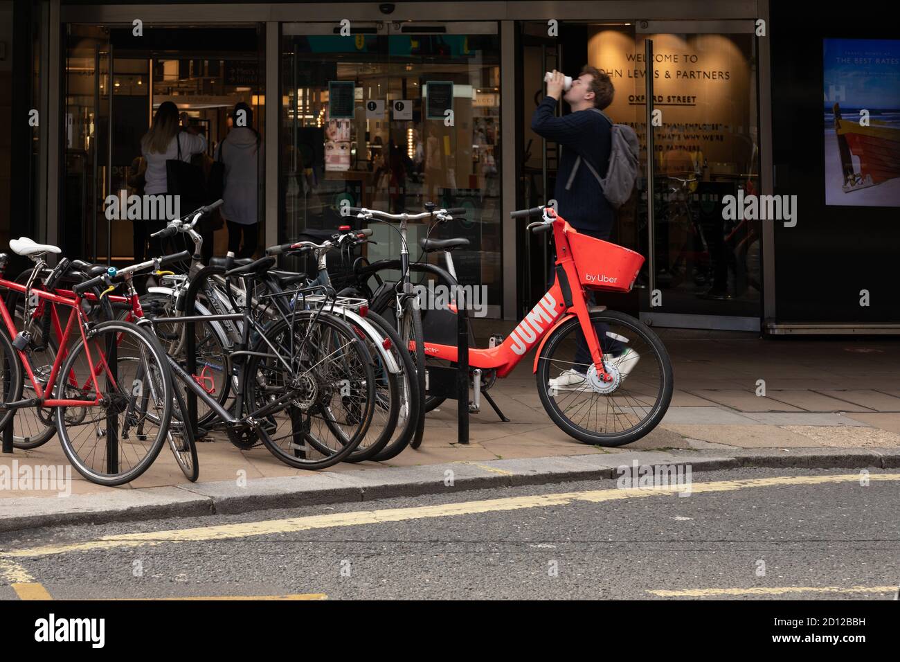 London Buses Bikes Taxis and Ambulances Stock Photo - Alamy
