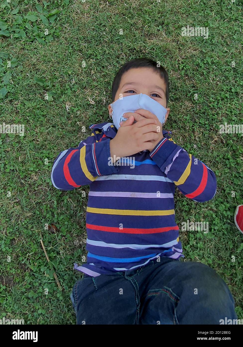 Kids play wearing mask after the coronavirus lockdown in asian ...