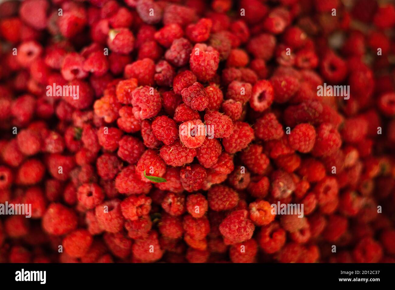 Lots red ripe raspberries hi-res stock photography and images - Alamy