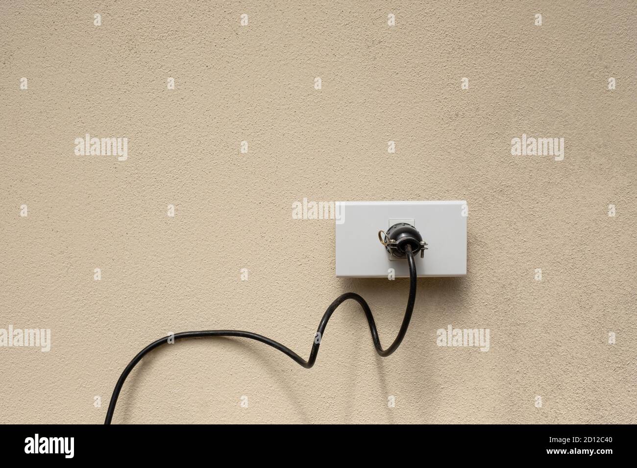 Electric wire plug Receptacle on the concrete wall background Stock ...