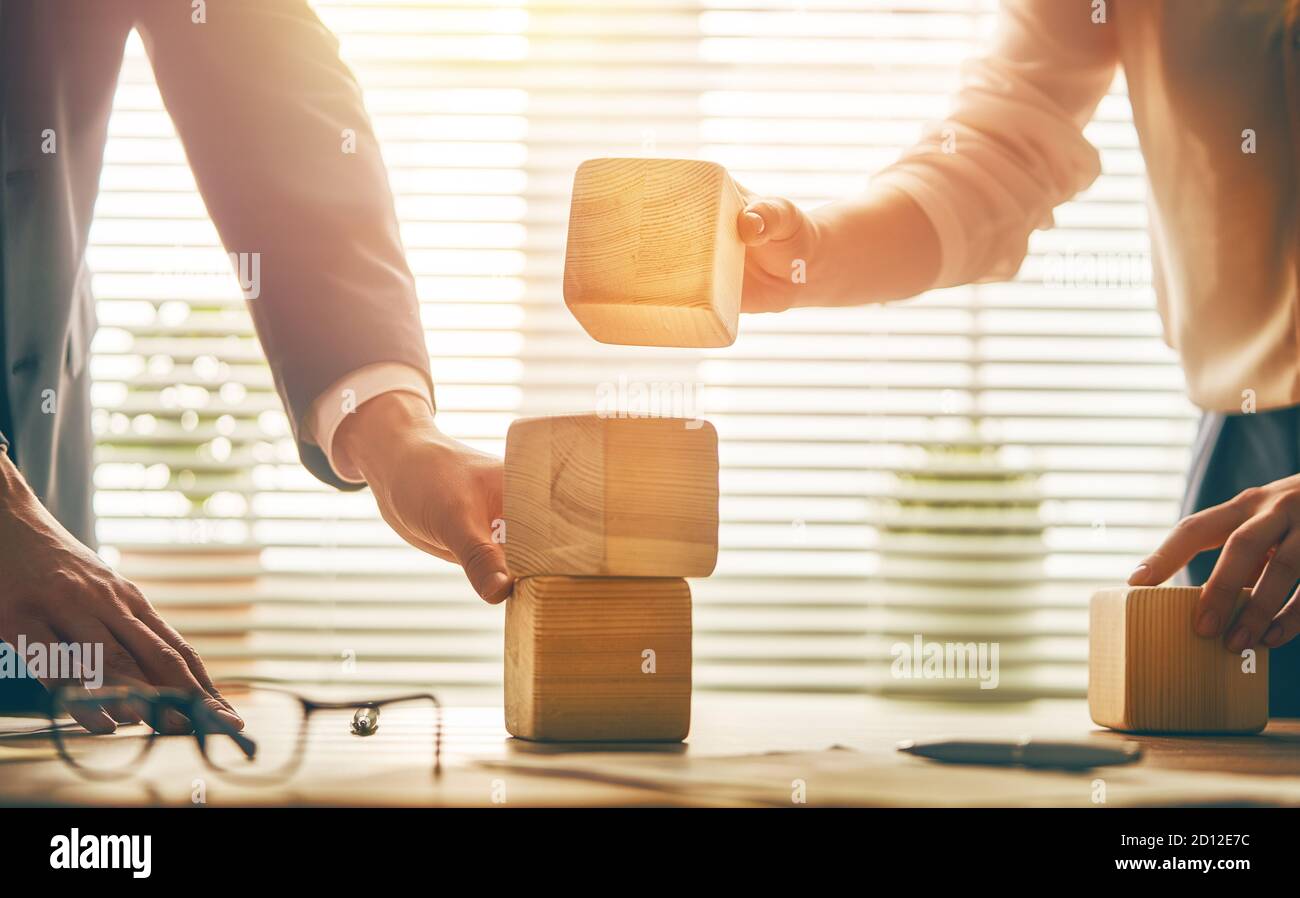 two business persons plan a project. team work in office Stock Photo ...