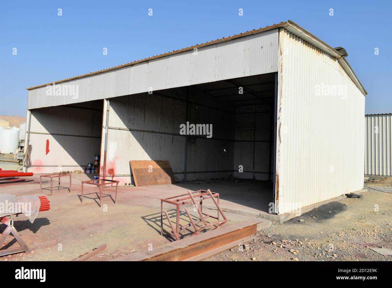 Sandwich panel. Industrial warehouse construction and interior view of ...