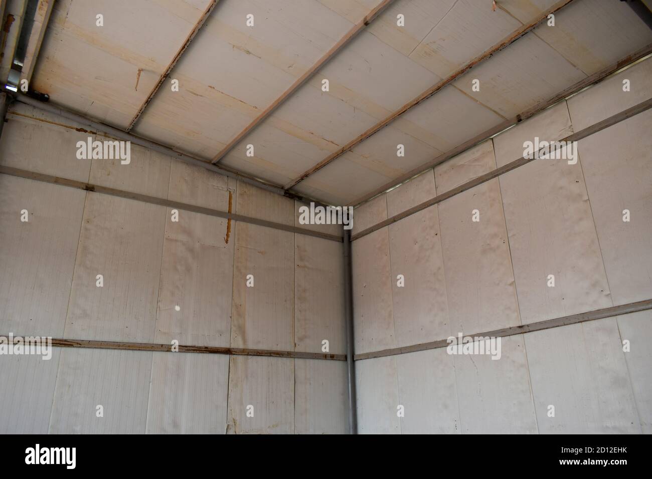 Sandwich panel. Industrial warehouse construction and interior view of ...