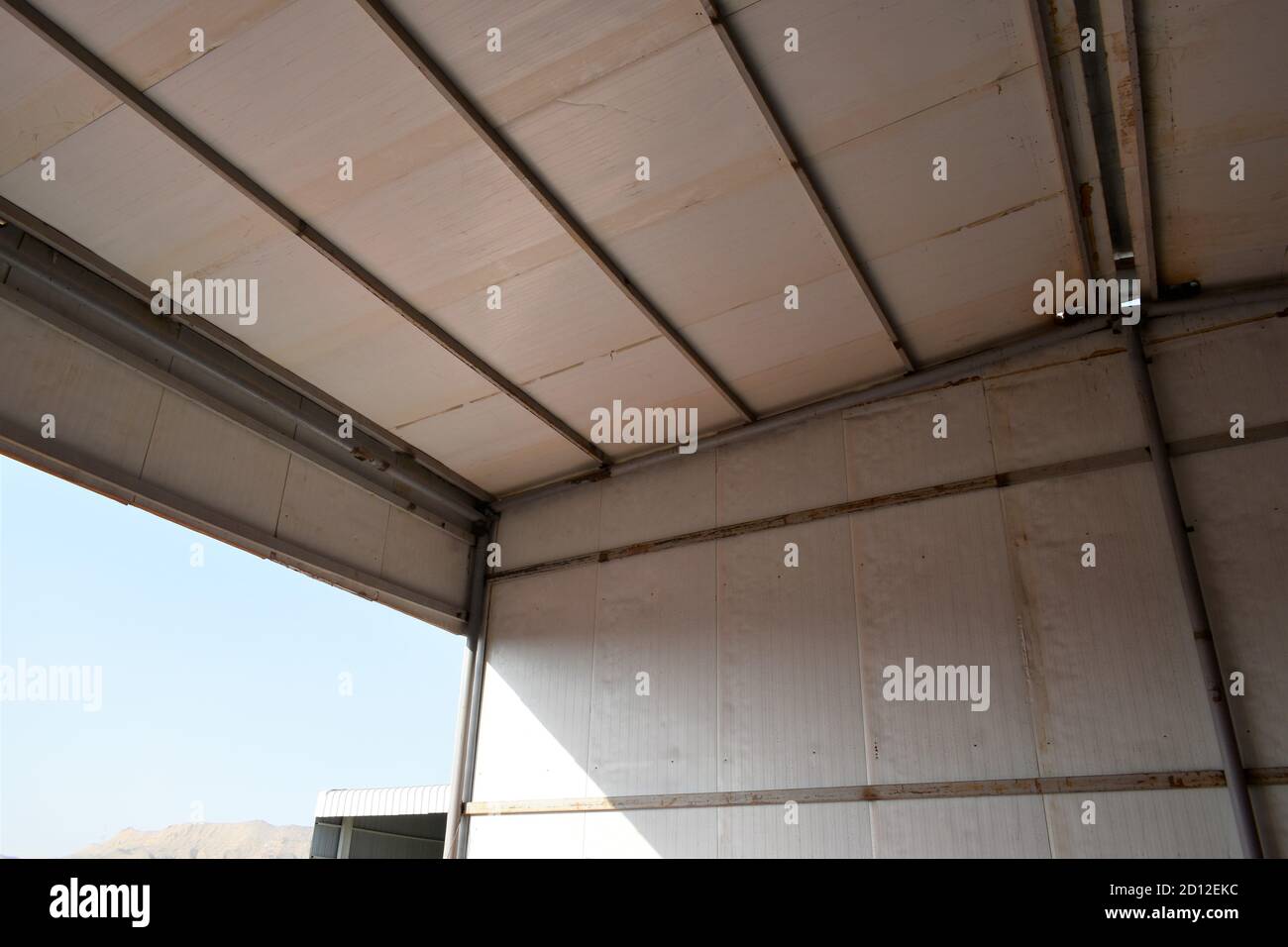 Sandwich panel. Industrial warehouse construction and interior view of ...