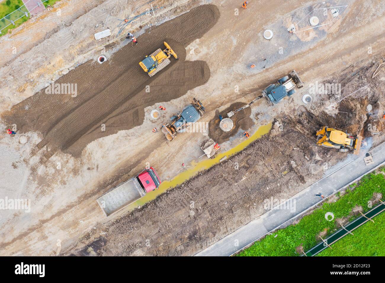 Construction of a city street, laying of communications, installation ...