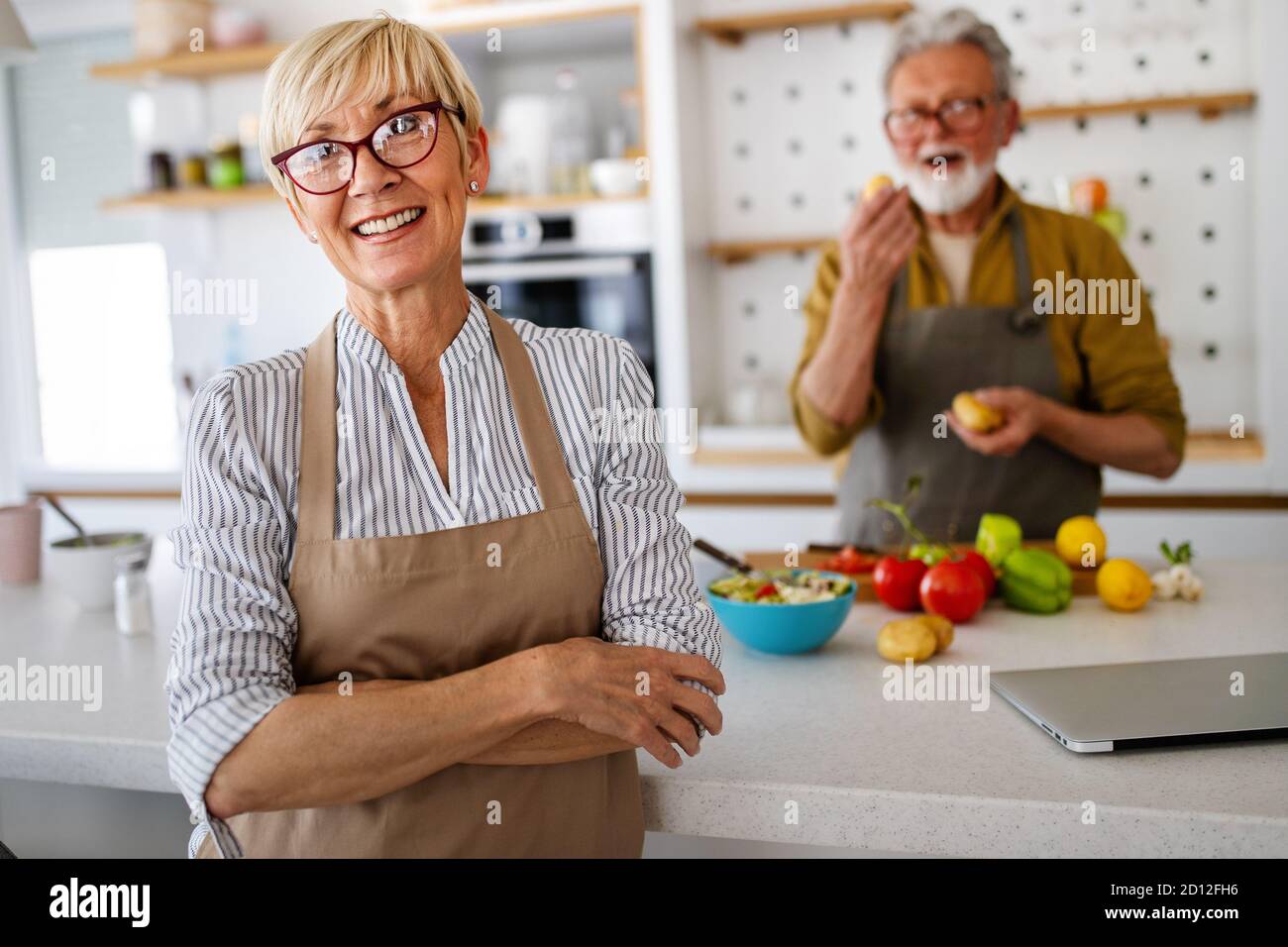 Couple home having fun cooking hi-res stock photography and images - Alamy