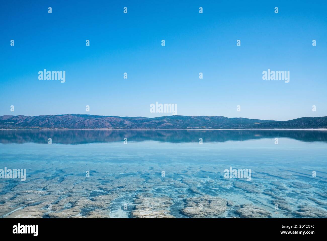 The bottom and surface with crystal clean water of Salda Lake in Turkey ...