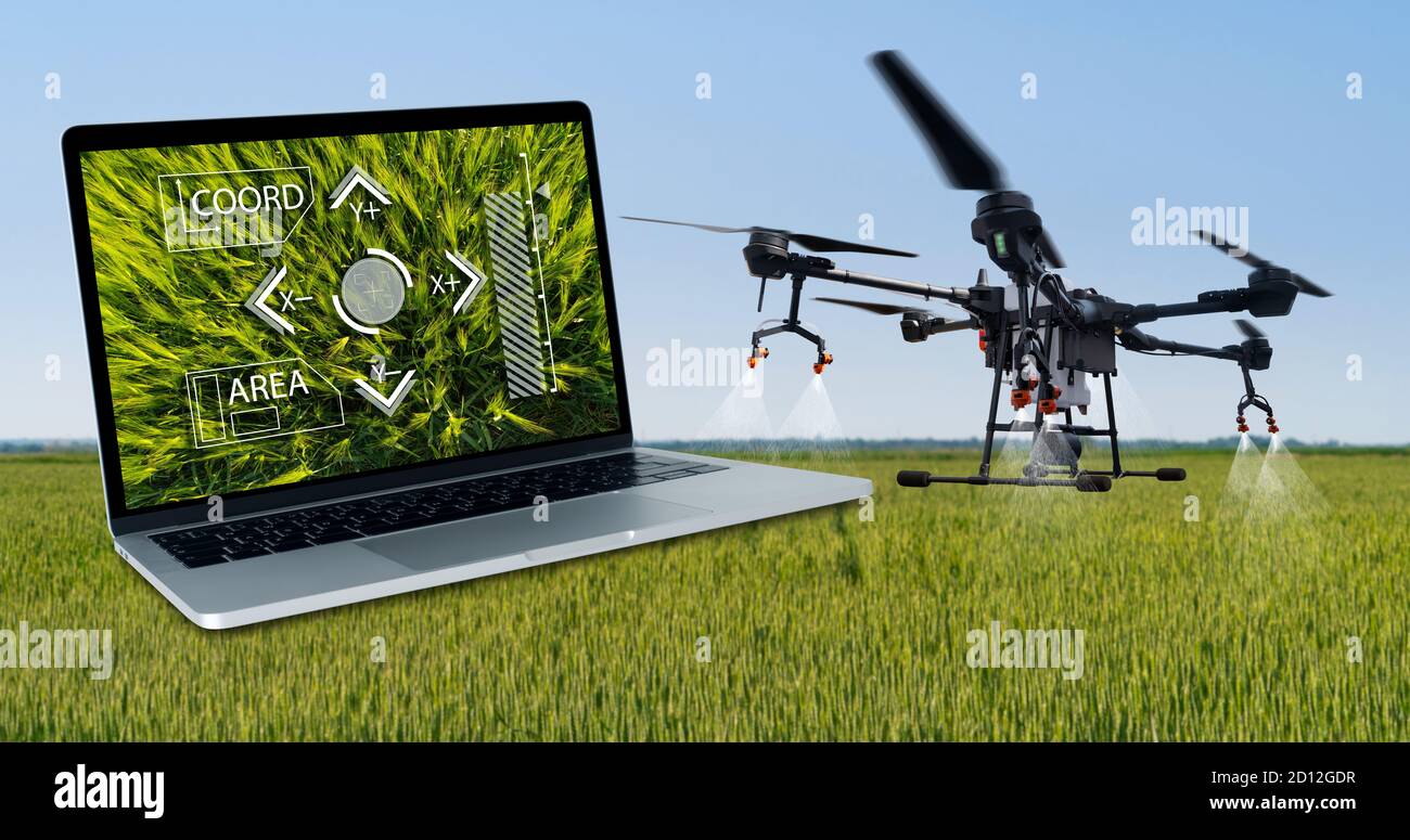Drone sprayer and laptop. Smart farm Stock Photo - Alamy