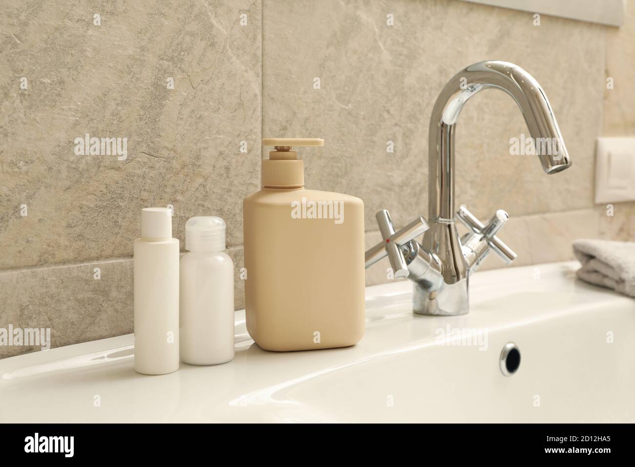Sink and personal hygiene accessories in bathroom Stock Photo - Alamy