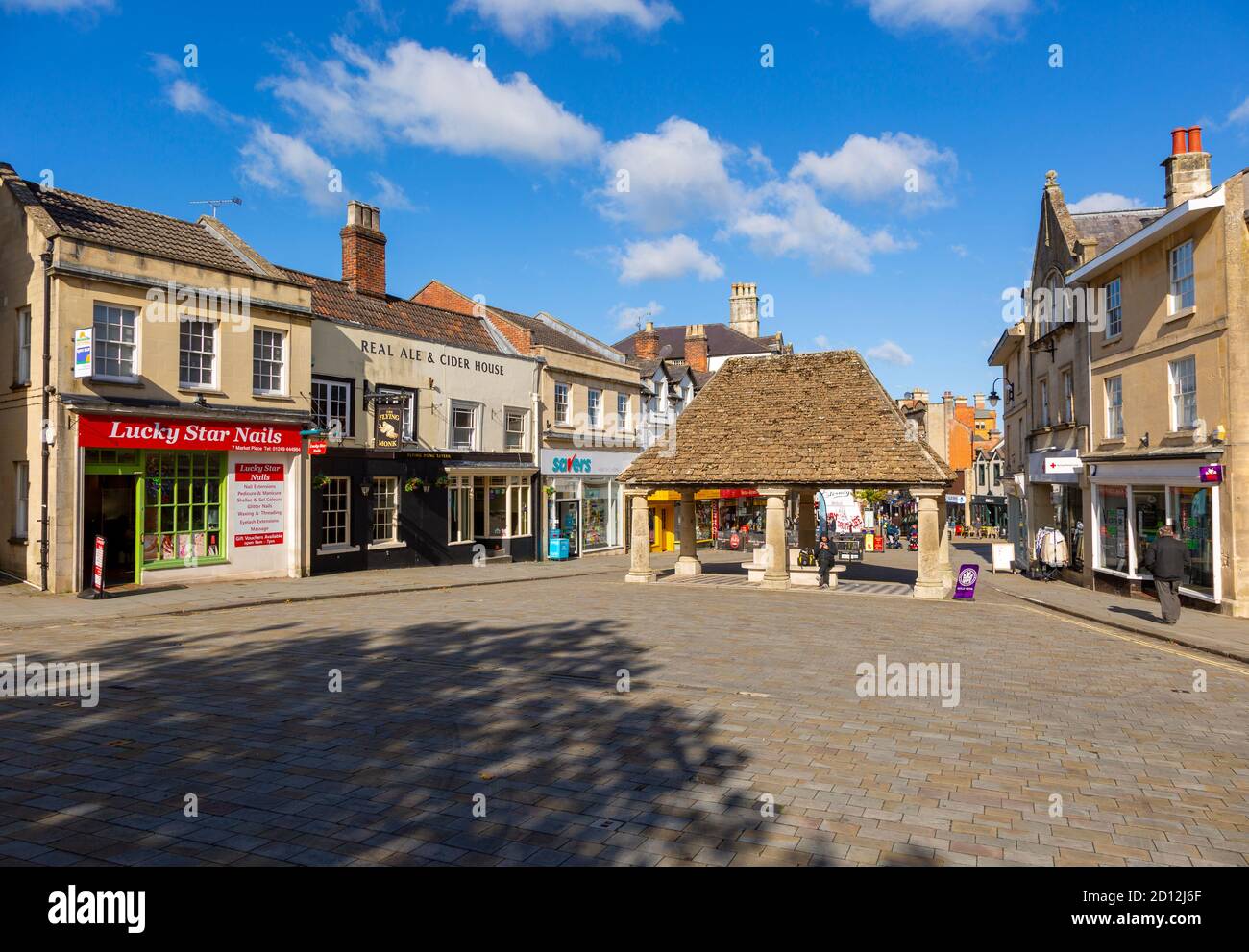 Historic buildings around the 16th century Buttercross, in Market Place ...