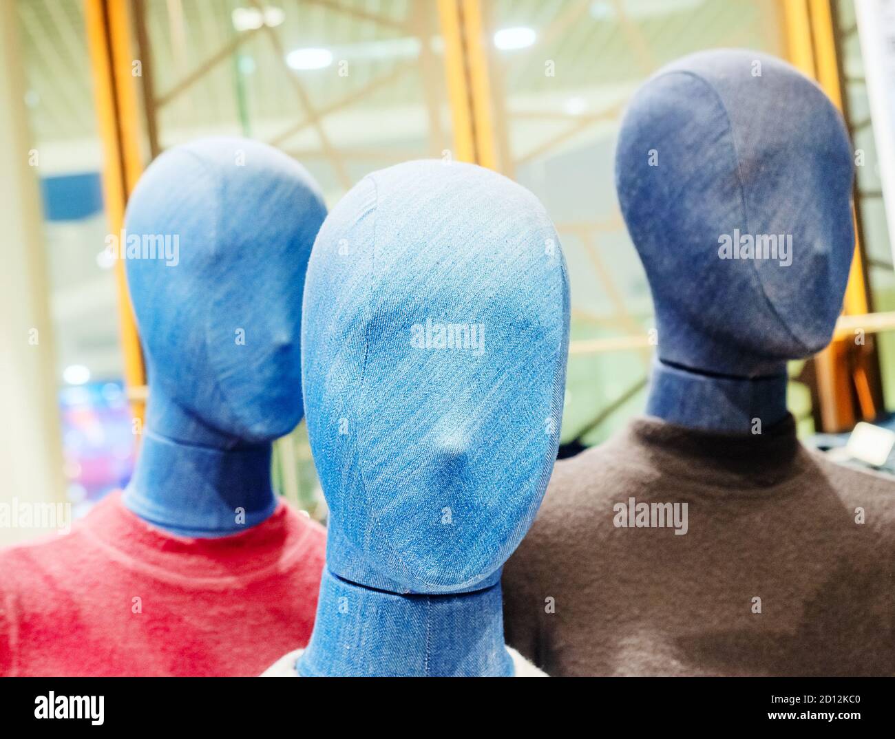 Mannequin covered with blue denim on the background of similar ...