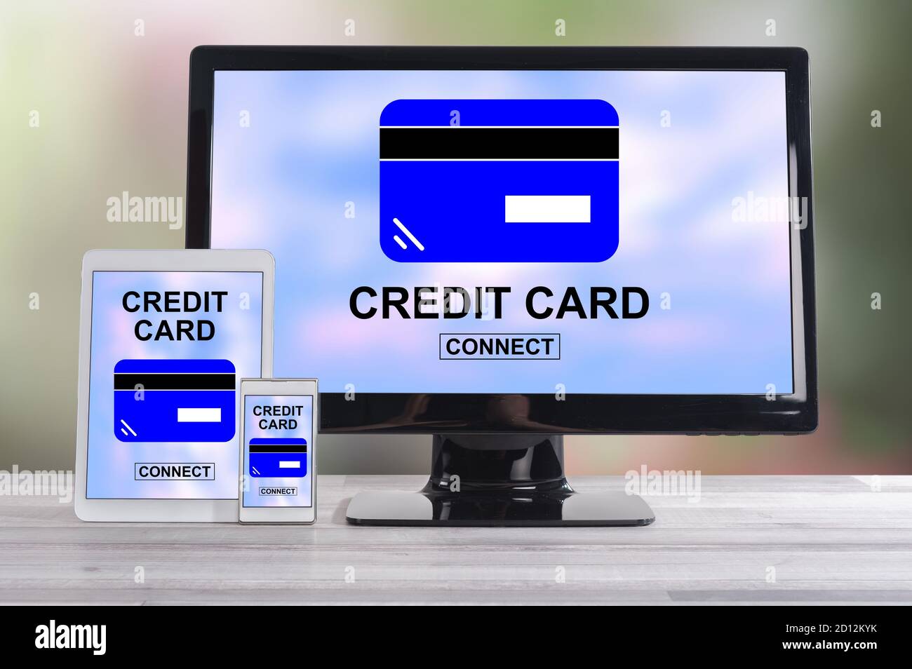 Credit card concept shown on different information technology devices ...