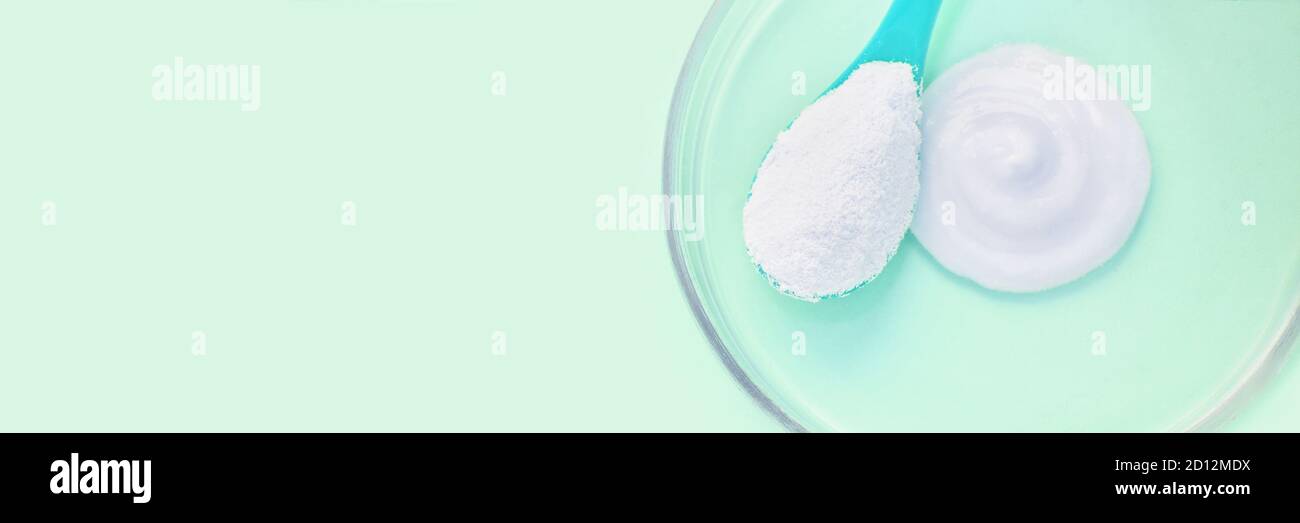 Collagen white powder. Pastel color background. Health product Stock ...