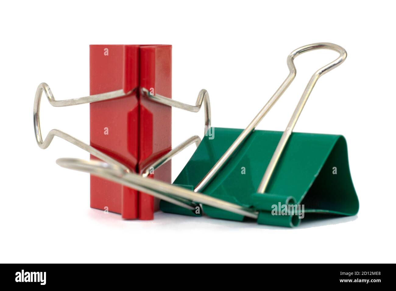 two red and green stationery clips isolated on white background Stock ...