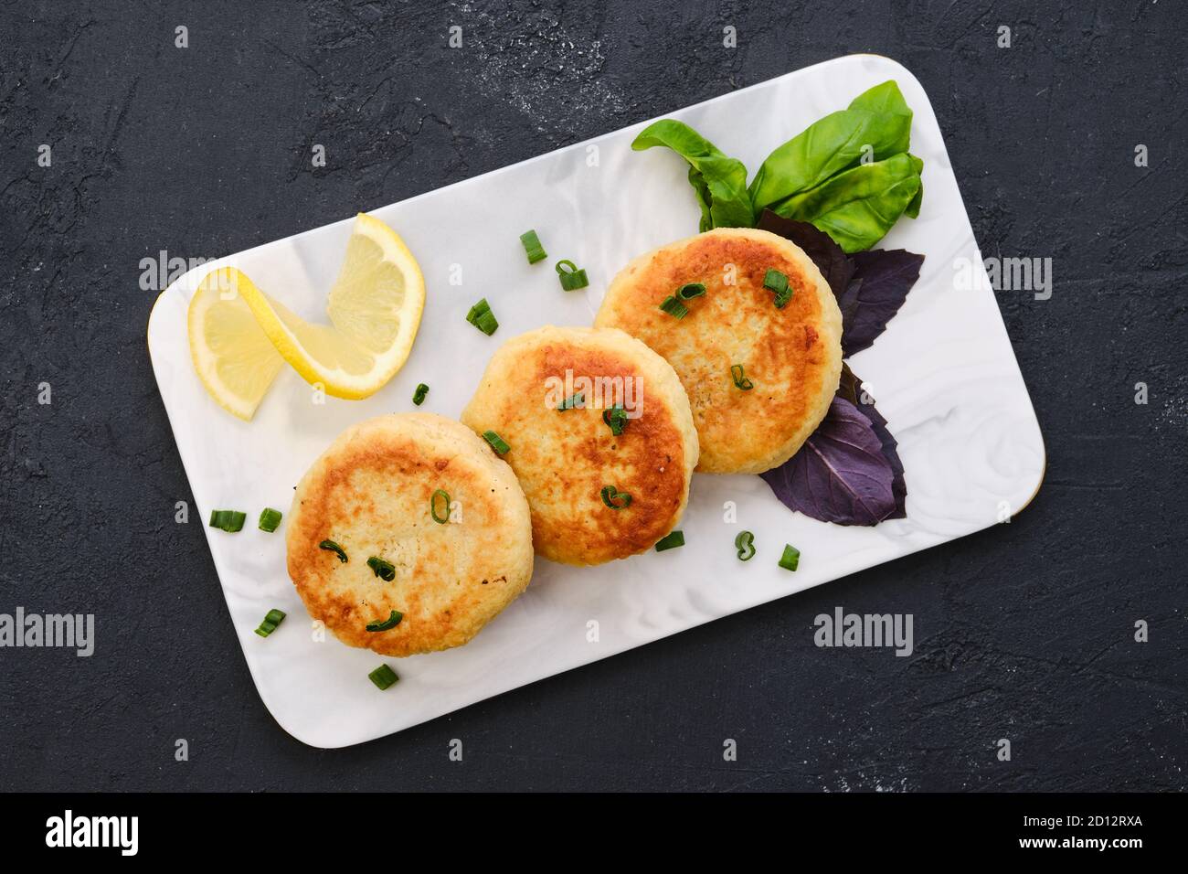 Top view of fried cod meat cutlet Stock Photo - Alamy
