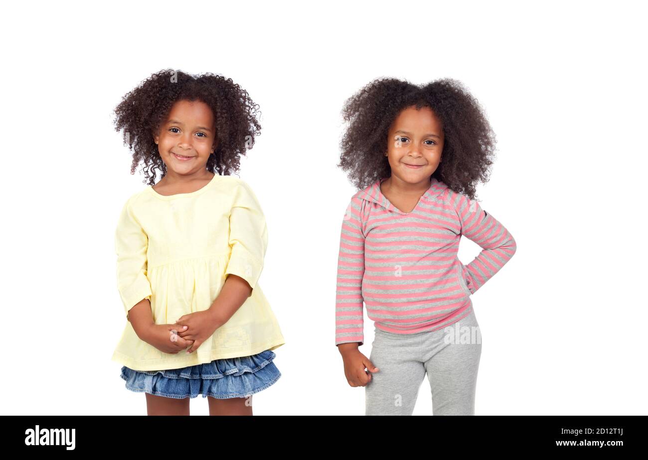 Happy cute twins with a curly afro hair isolated on a white background ...