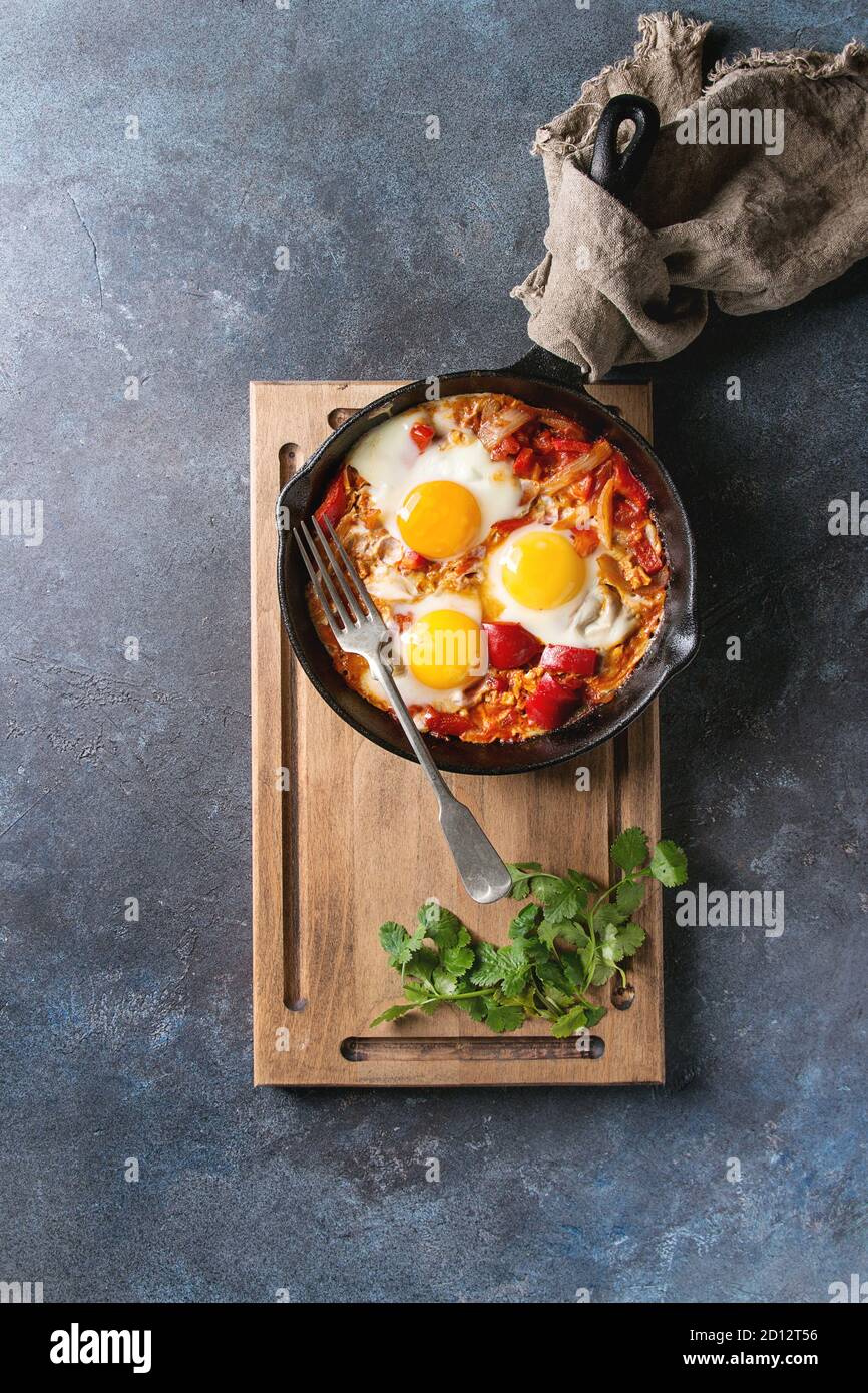 Traditional Israeli Cuisine dishes Shakshuka. Fried egg with vegetables ...