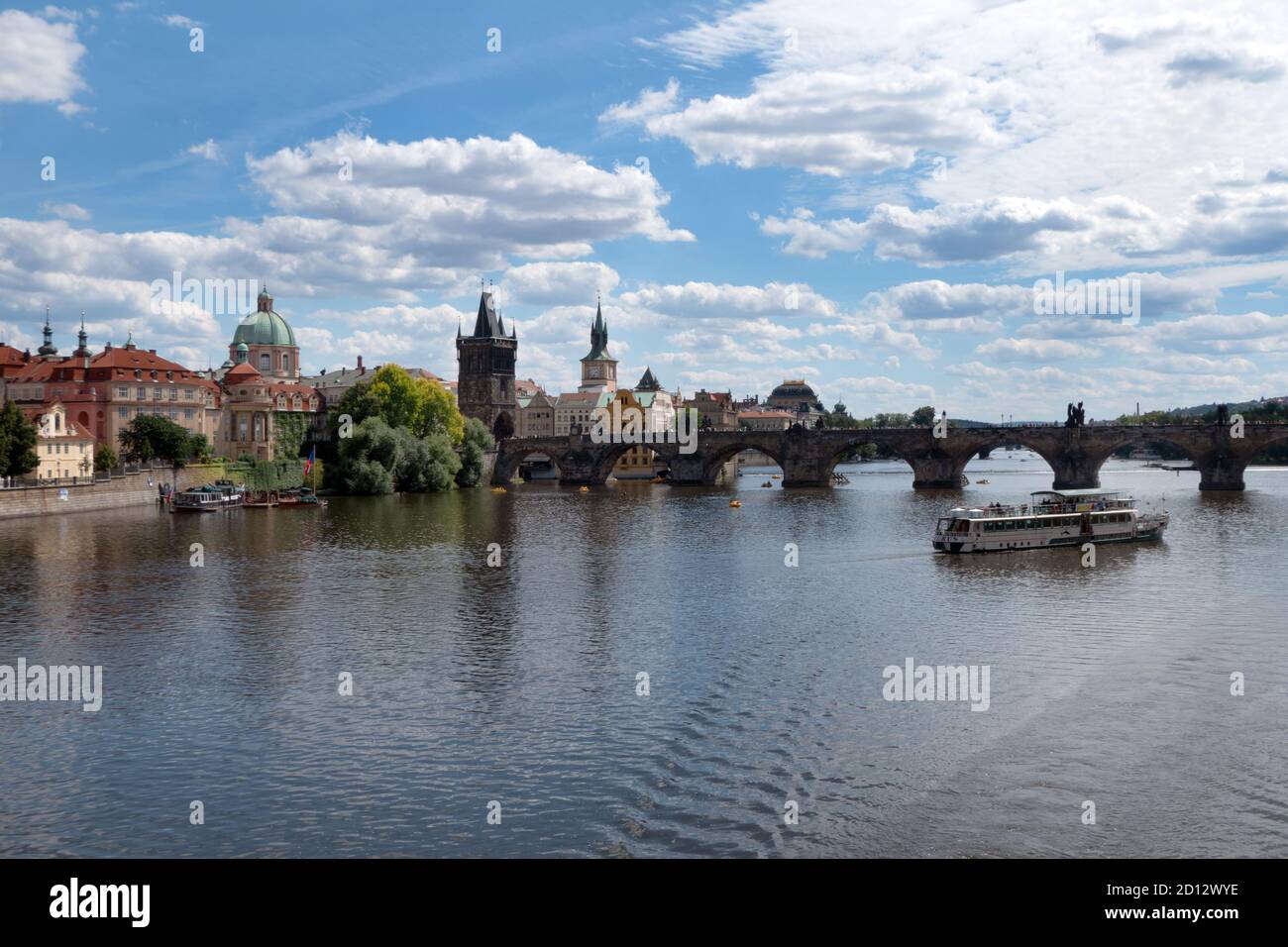View of Charles Bridge, tourist attraction on the Vltava (Moldau) river ...