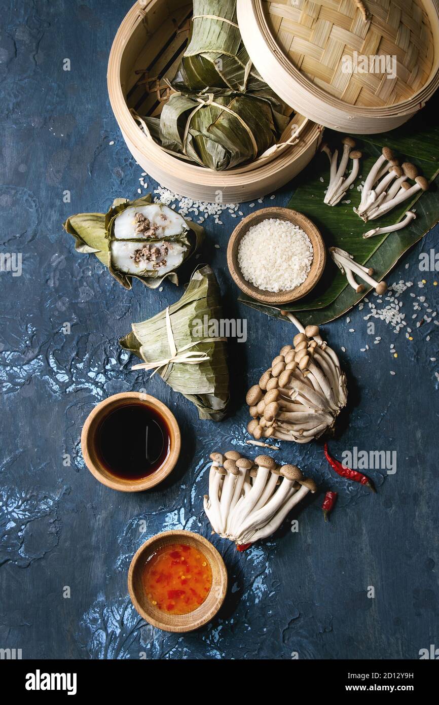 Rice dumpling wrapped in bamboo leaves hi-res stock photography and ...