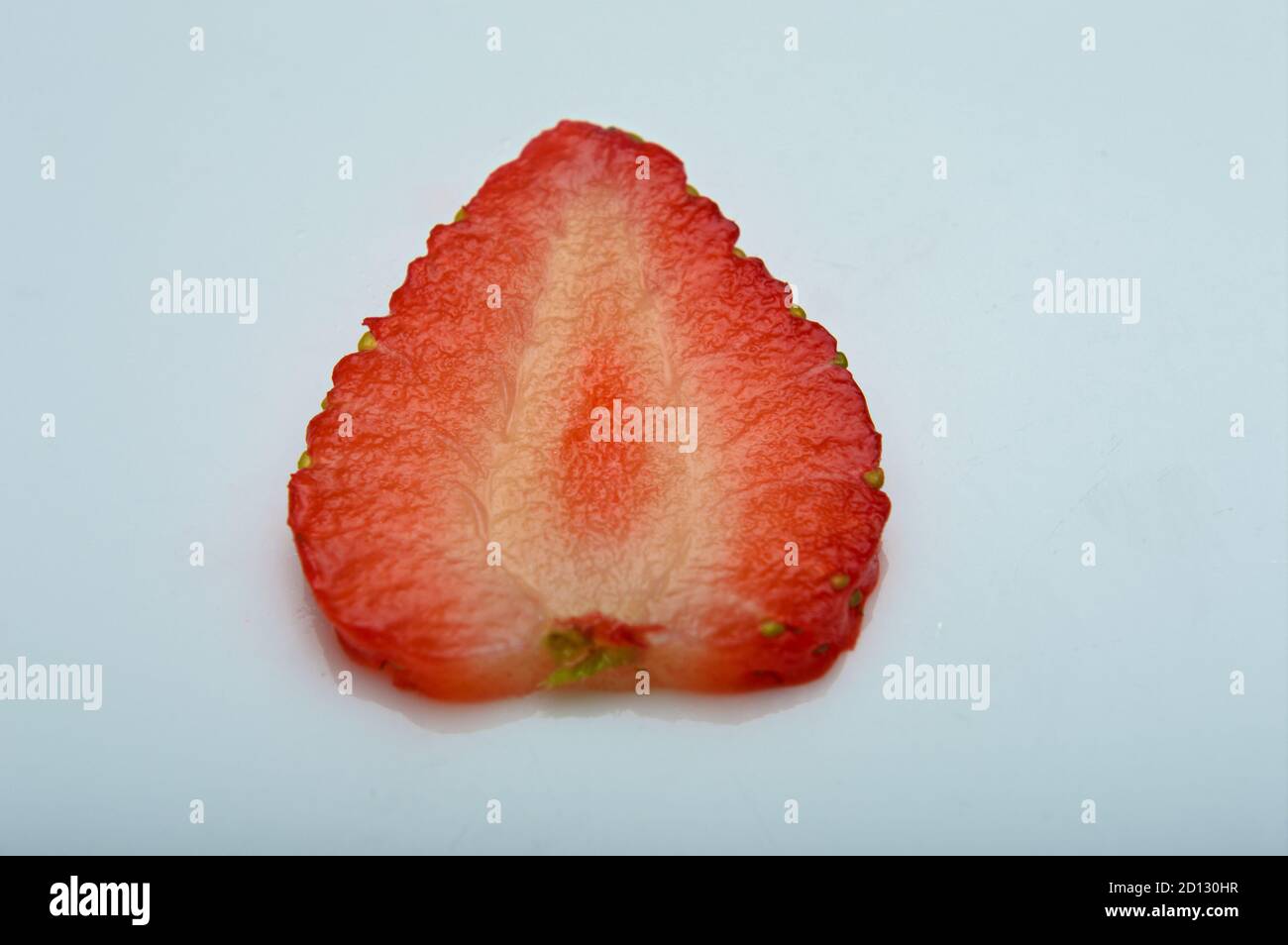 Single slice of a Strawberry Stock Photo - Alamy