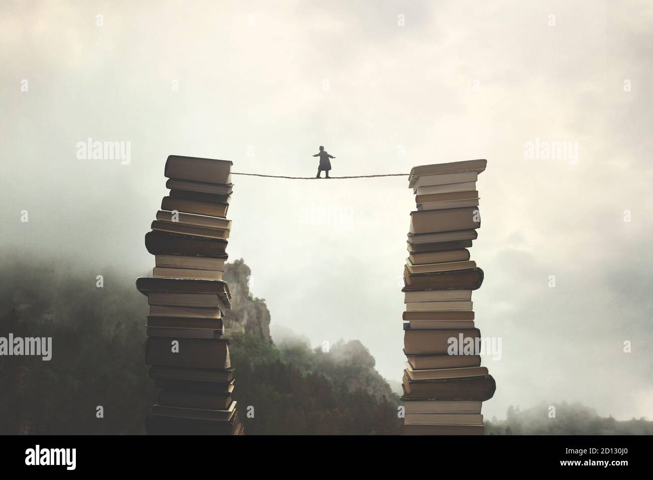 success and knowledge concepts of a man walking on a rope to move from ...