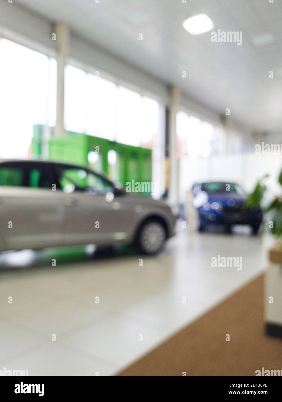 Car selling dealership inside store with blur background Stock Photo ...