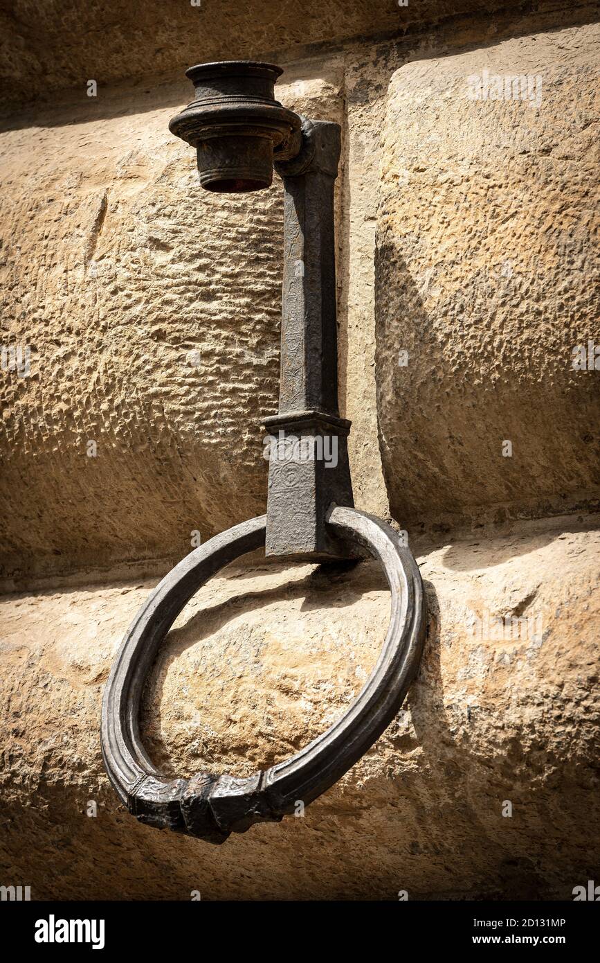 Ancient wrought iron ring for tying with rope the animals, horses ...