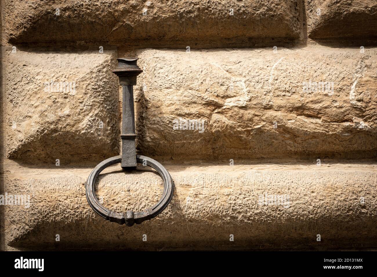 Ancient wrought iron ring for tying with rope the animals, horses ...