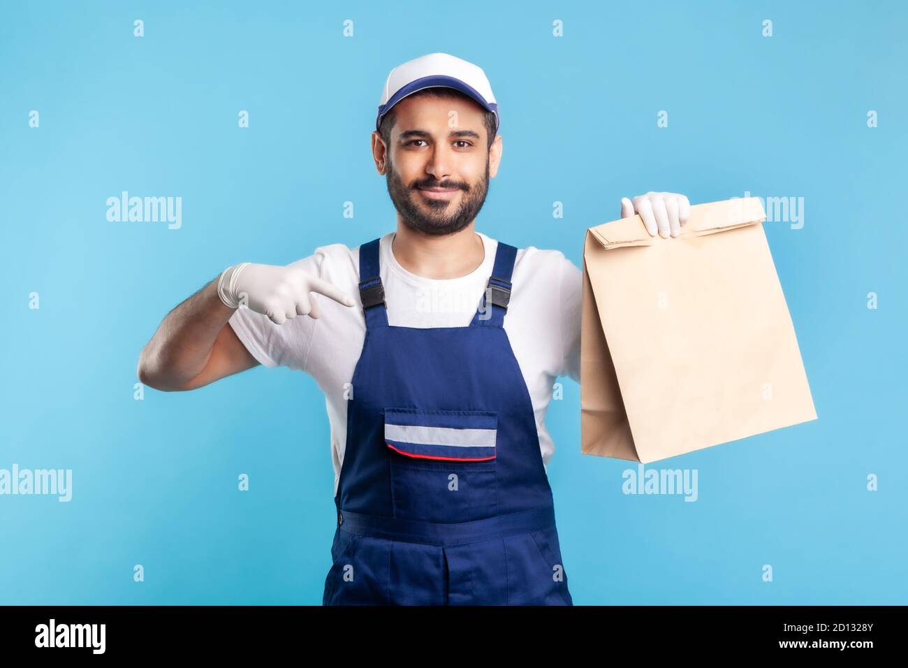 Postman delivering mail in gloves hi-res stock photography and images ...
