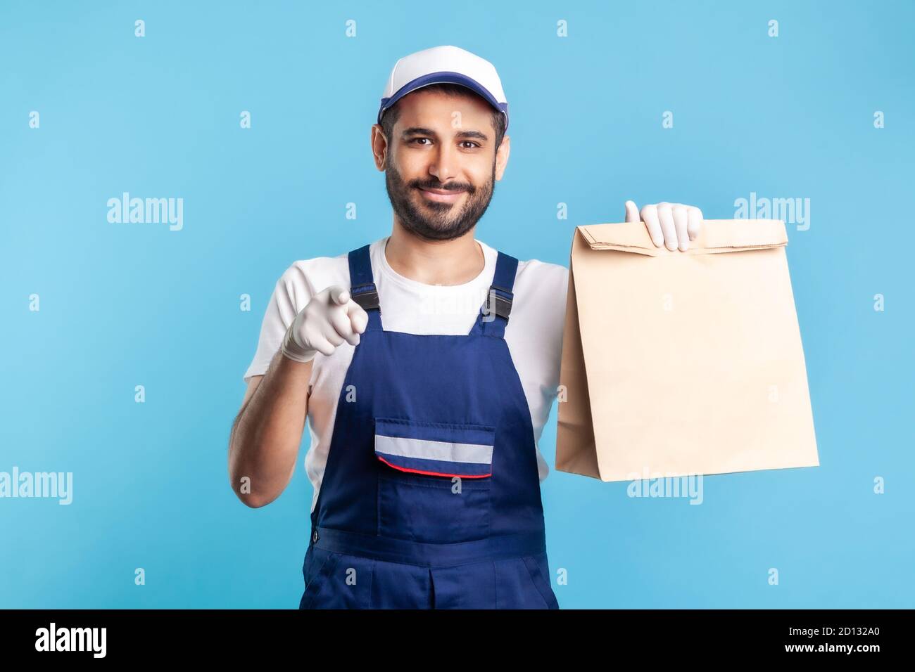 Postman delivering in gloves hi-res stock photography and images - Alamy