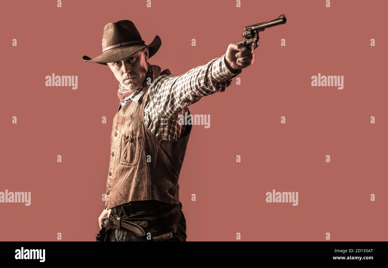 Cowboy with weapon on red background. American bandit in mask, western ...