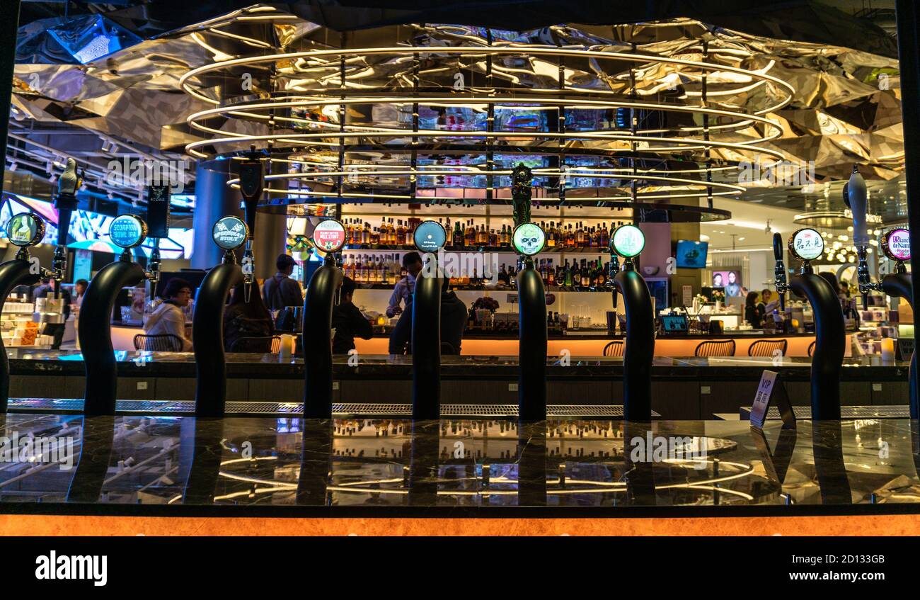 Beer taps at a trendy bar in Shenzhen, China Stock Photo - Alamy