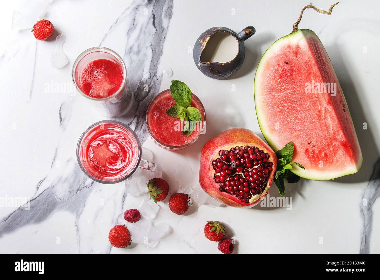 Three different red fruit berry watermelon, strawberry, raspberry ...