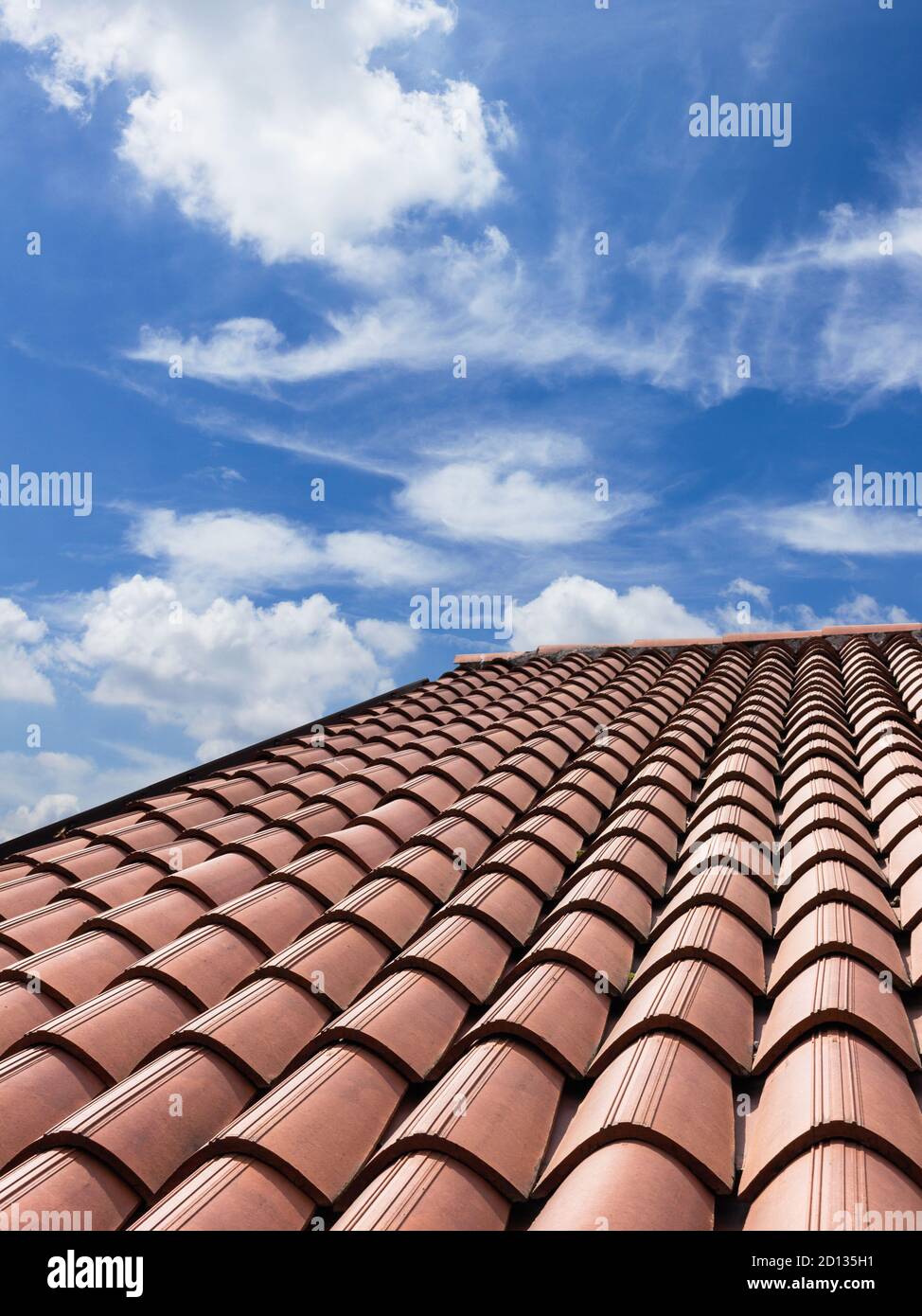 New tiled roof. Vertical view of a tiled roof brown Stock Photo - Alamy