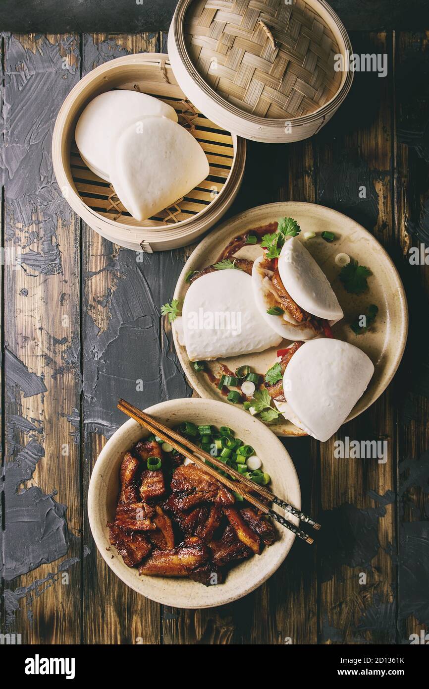 Asian sandwich steamed gua bao buns with pork belly, greens and ...