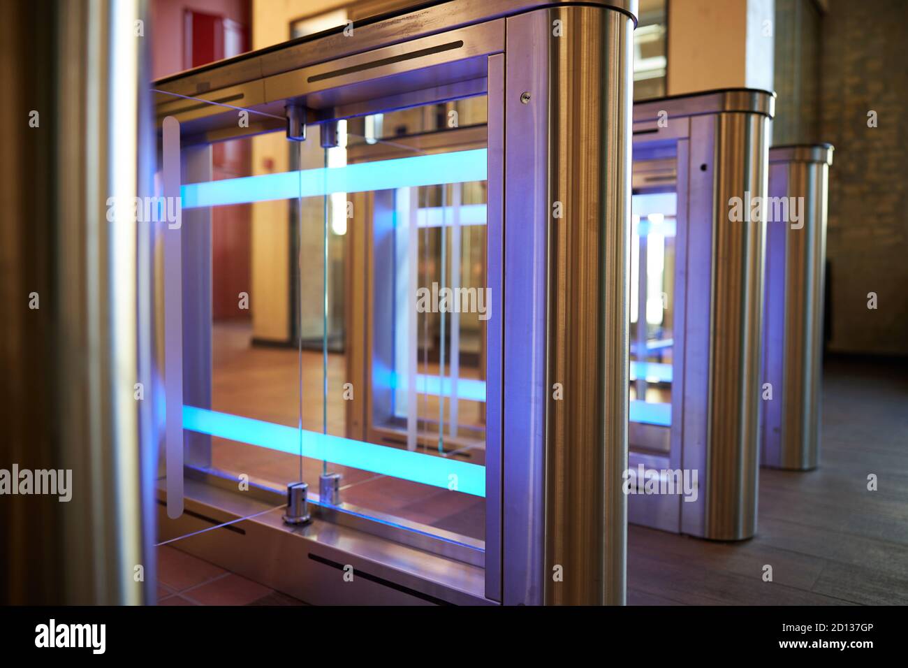 Focused photo on turnstiles standing on the entrance Stock Photo - Alamy