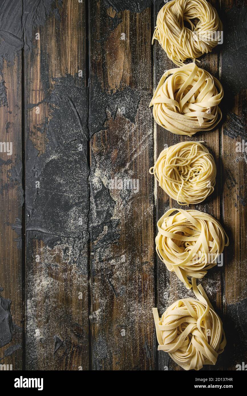 Variety of italian homemade raw uncooked pasta spaghetti and ...