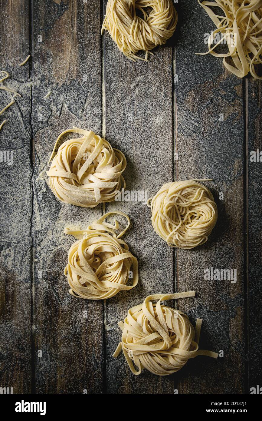 Variety of italian homemade raw uncooked pasta spaghetti and ...