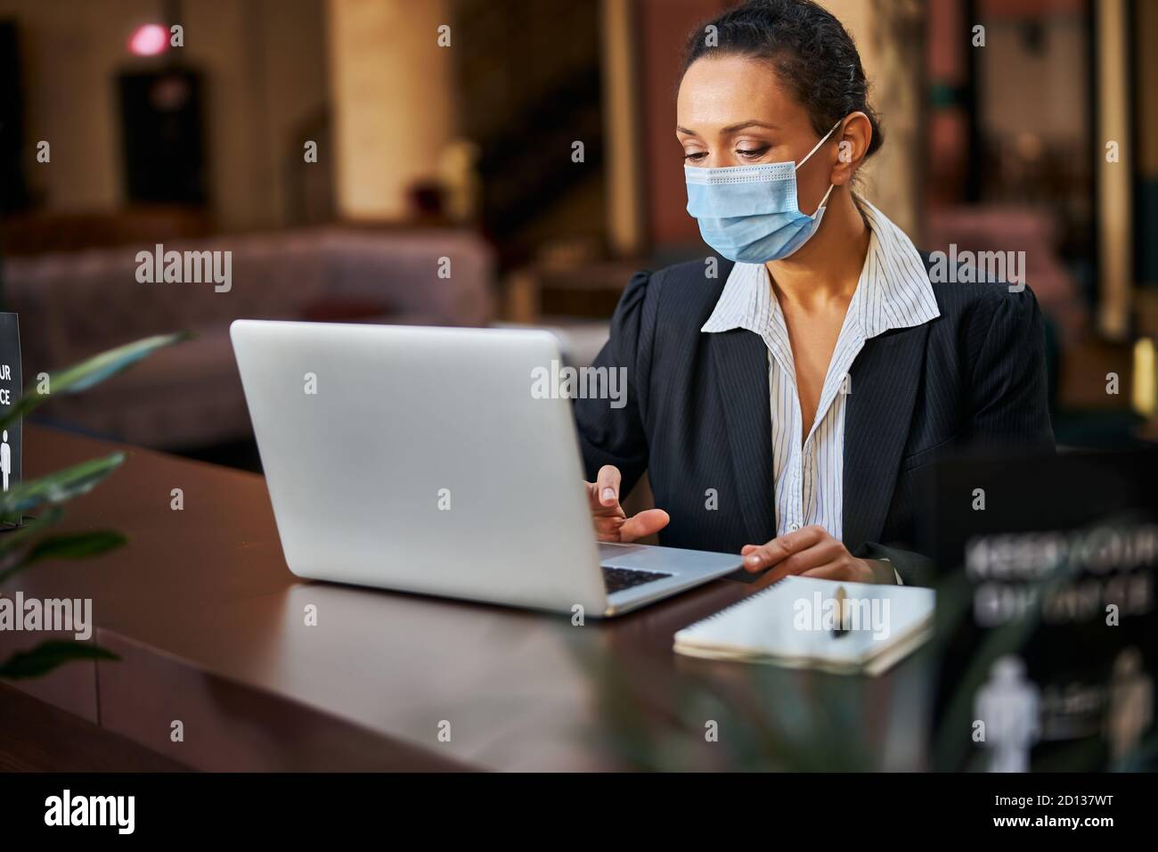 Woman staring distance office hi-res stock photography and images - Alamy