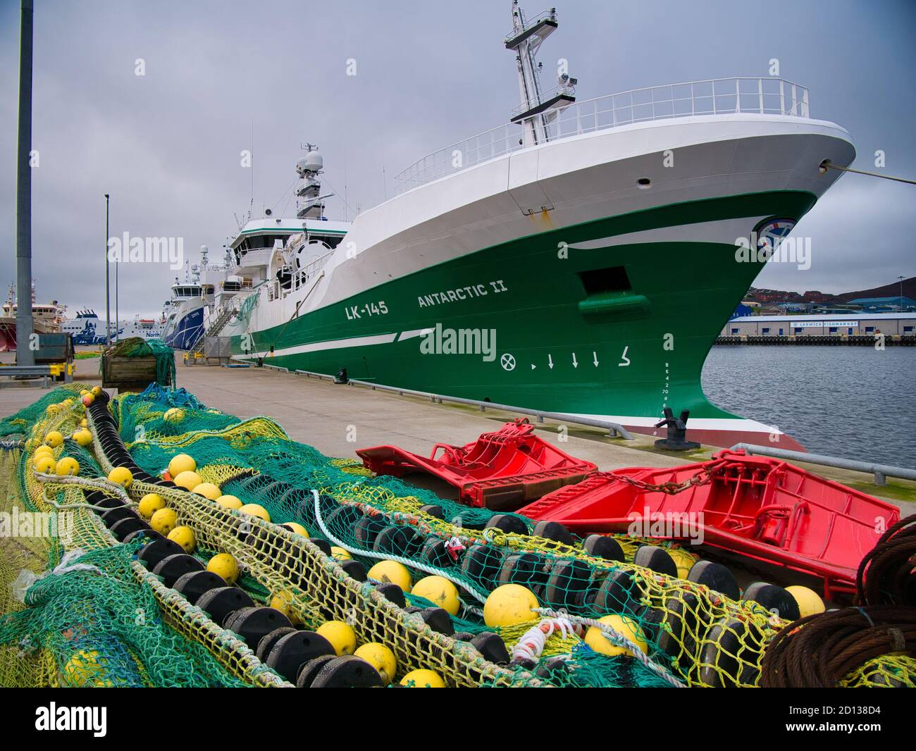 With nets in the foreground and moored at Lerwick harbour, the ...