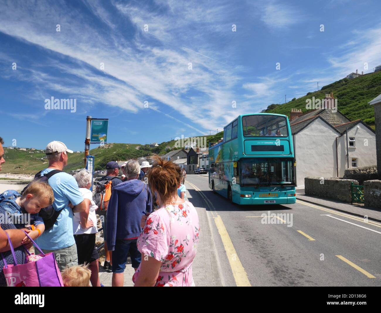 Waiting for the Atlantic Coaster open top 'bus at Sennen Cove, near ...